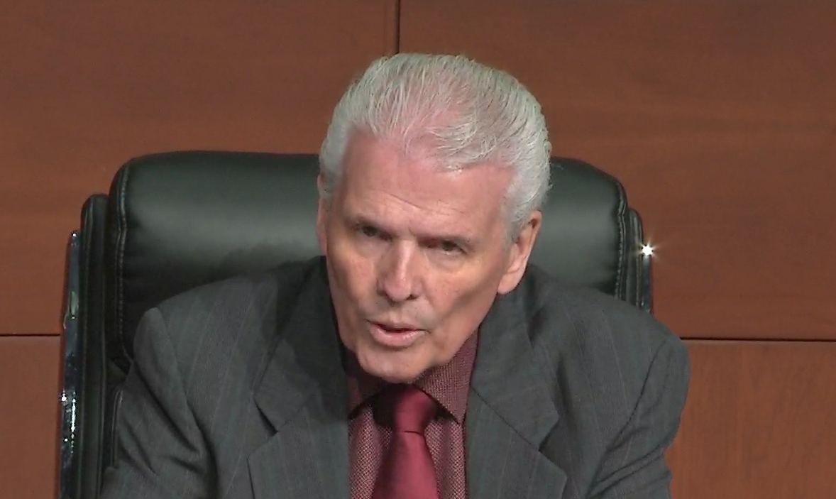 Surprise woman sues over arrest for speaking out at public meeting